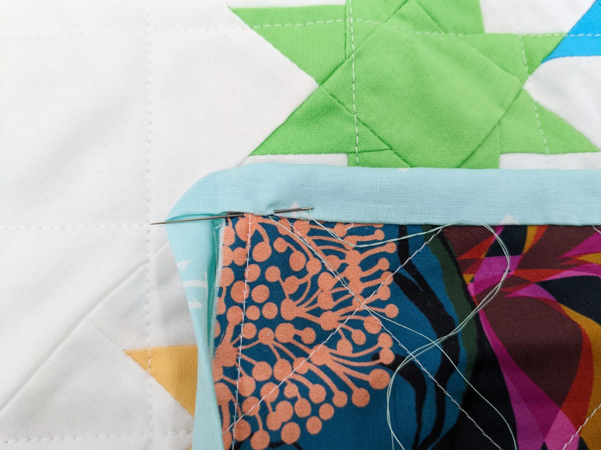 Perfect Hand Binding Tips – slightly biased quilts